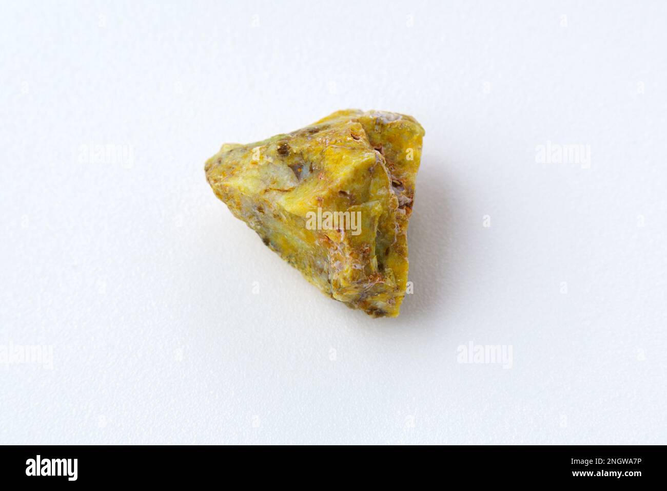 Rare boulder opal, mineral, white background. Opal is a hydrated ...