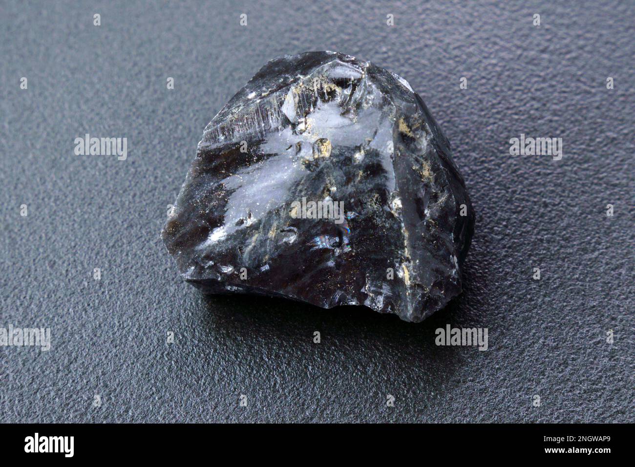 Obsidian rock. Volcanic material. Rough edges. Sharpest rock black ...
