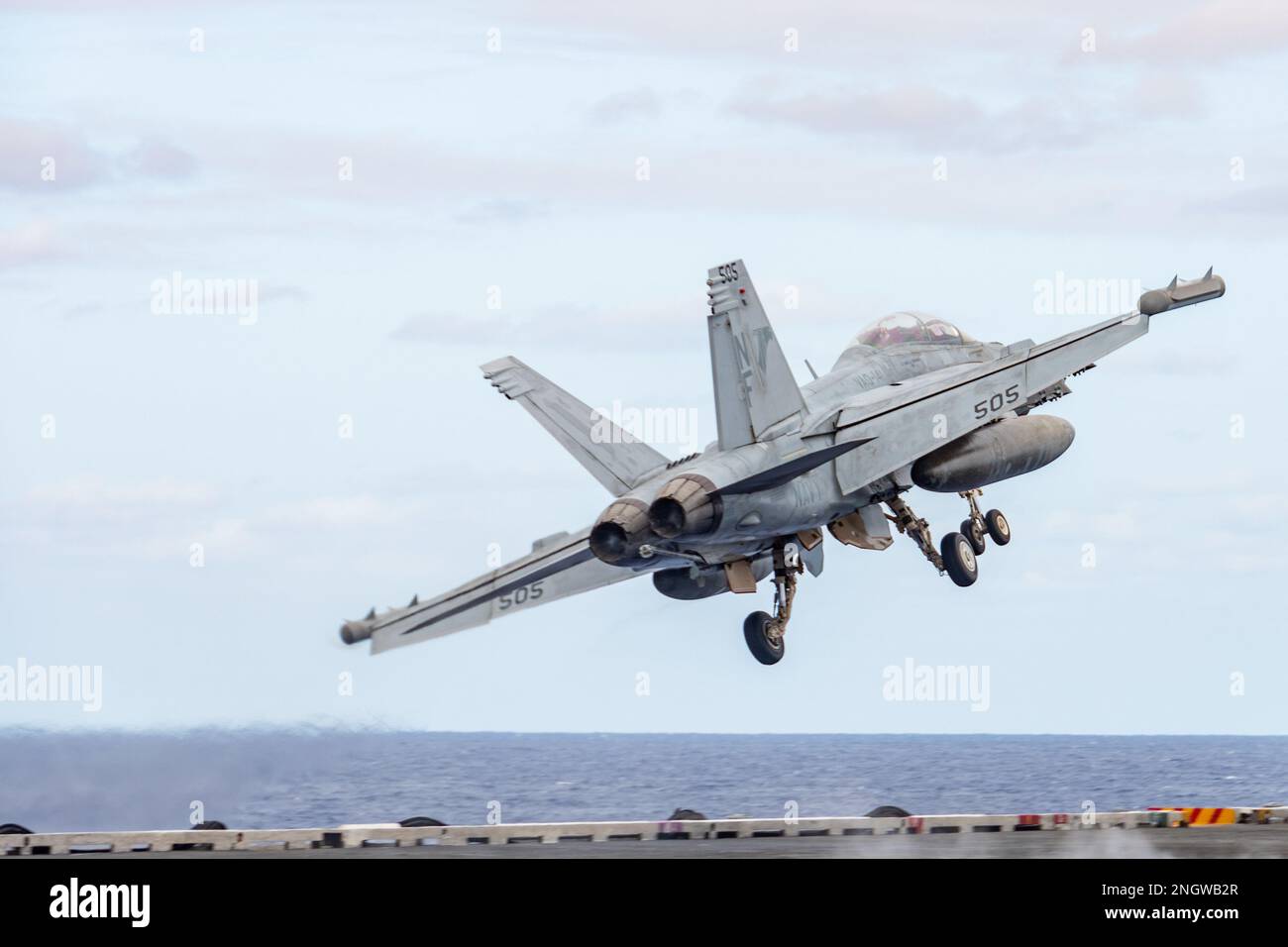 221125-N-BR419-2128 PHILIPPPINE SEA (Nov. 25, 2022) An EA-18G Growler, attached to the ...