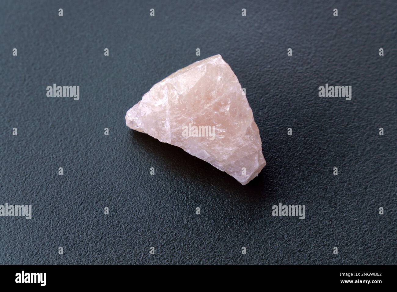 Rose quartz, stone silicate mineral. Rough, uncut, pinkish color black ...