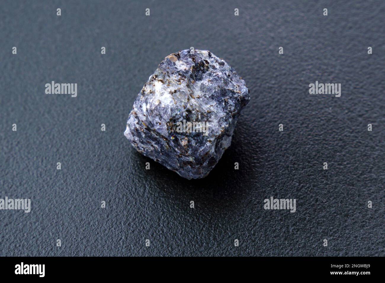 Crystal of cordierite iolite gem stone cutout, raw mineral, black ...