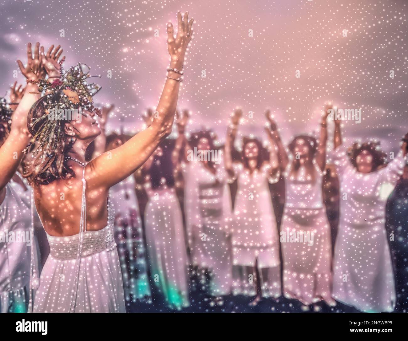 Women in flower wreath on sunny meadow, Floral crown, symbol of summer ...