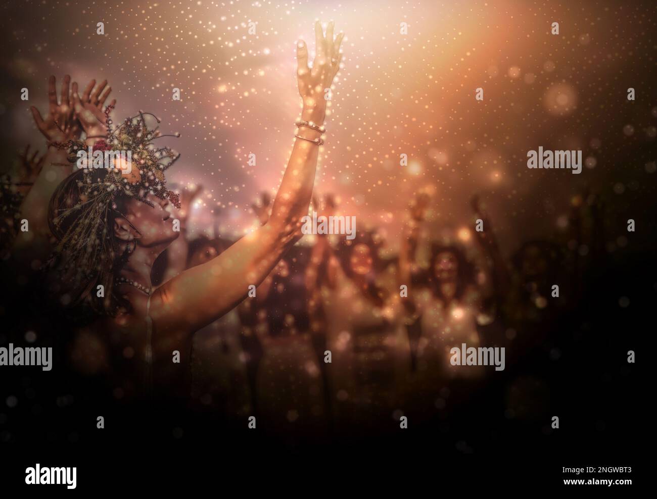 Women in flower wreath on sunny meadow, Floral crown, symbol of summer ...