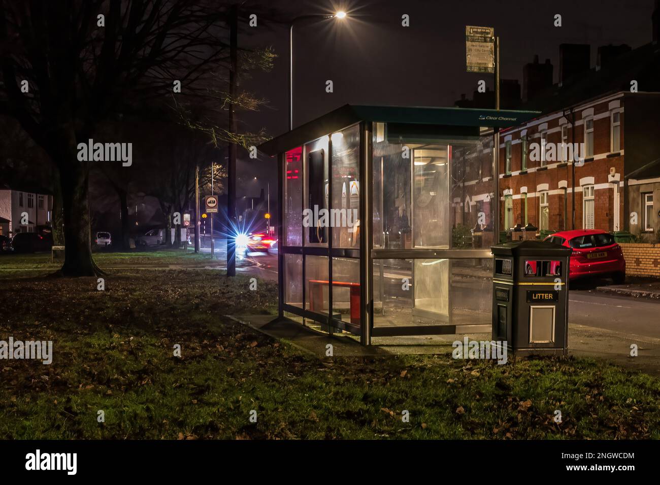 Bus stop in a suburban street in Cardiff at night Stock Photo - Alamy