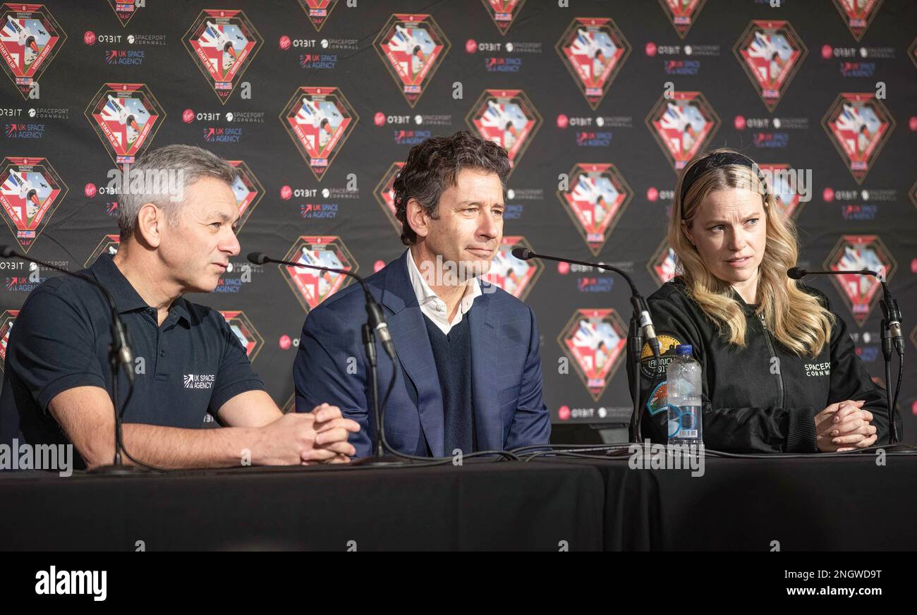Dan Hart, CEO of Virgin Orbit (C) Ian Ennett, Deputy CEO UKSA (L) and ...