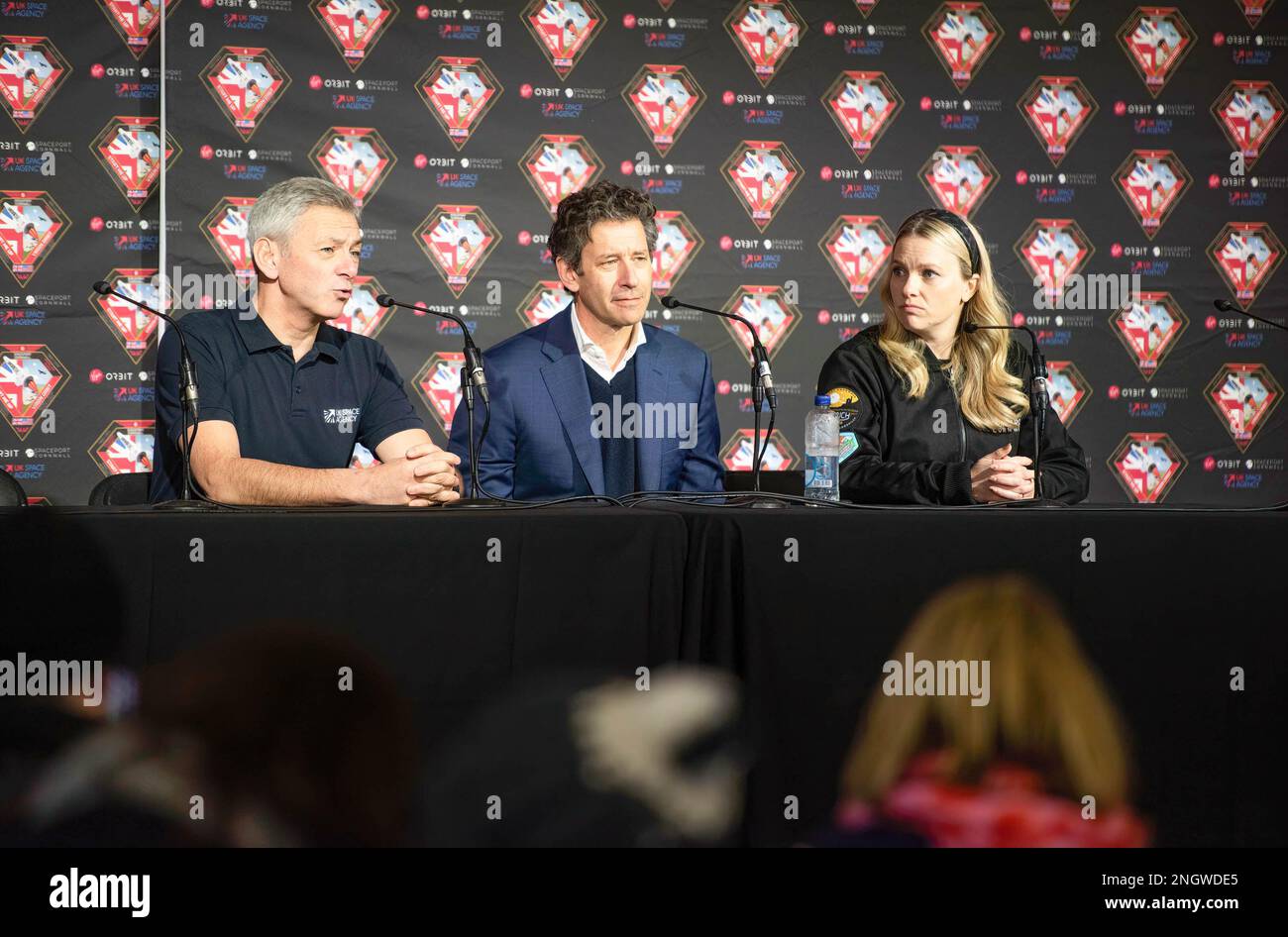Dan Hart, CEO of Virgin Orbit (C) Ian Ennett, Deputy CEO UKSA (L) and ...