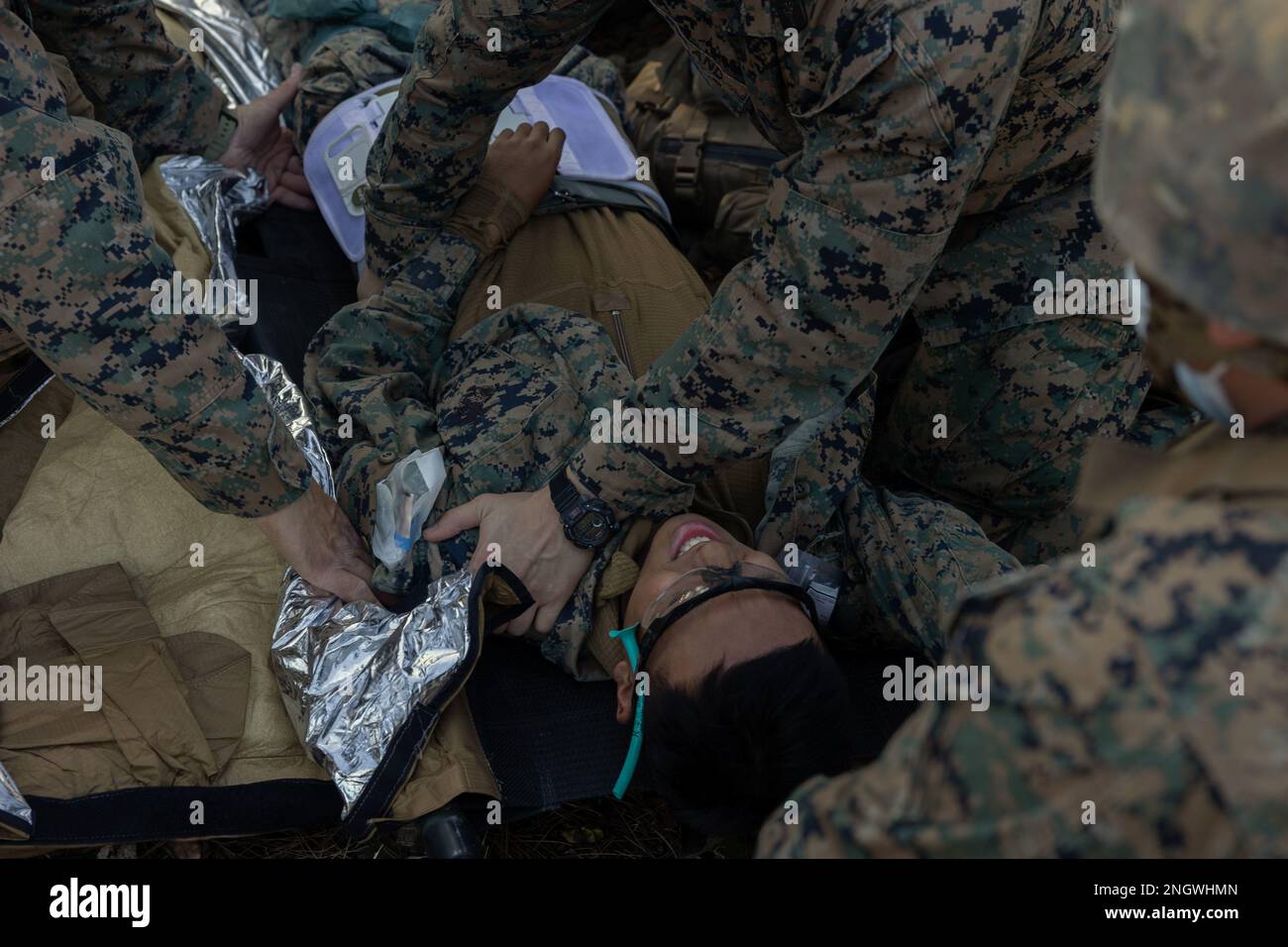 U.S. Navy Corpsmen with 3d Battalion, 12th Marines conduct medical evacuation drills during ...