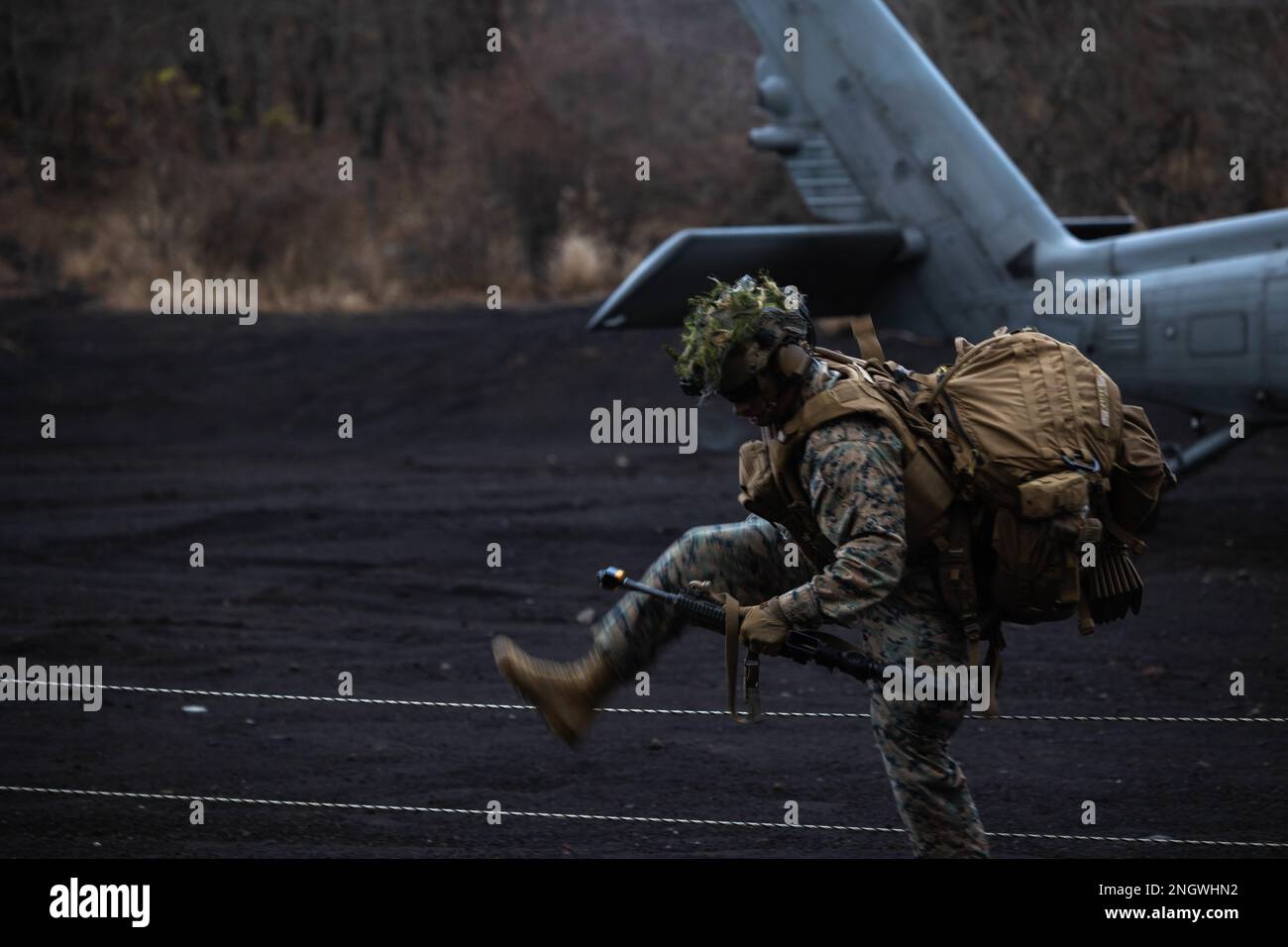 U.S. Marines with 1st Battalion, 2d Marines disembark a U.S. Navy MH ...