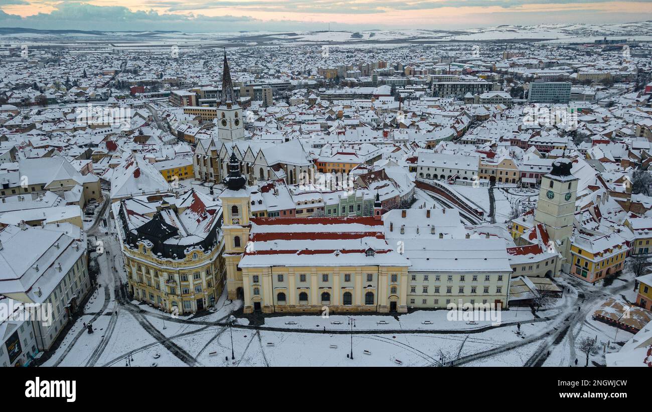 Birds eye view over historic city center of Sibiu, Romania at sunset ...