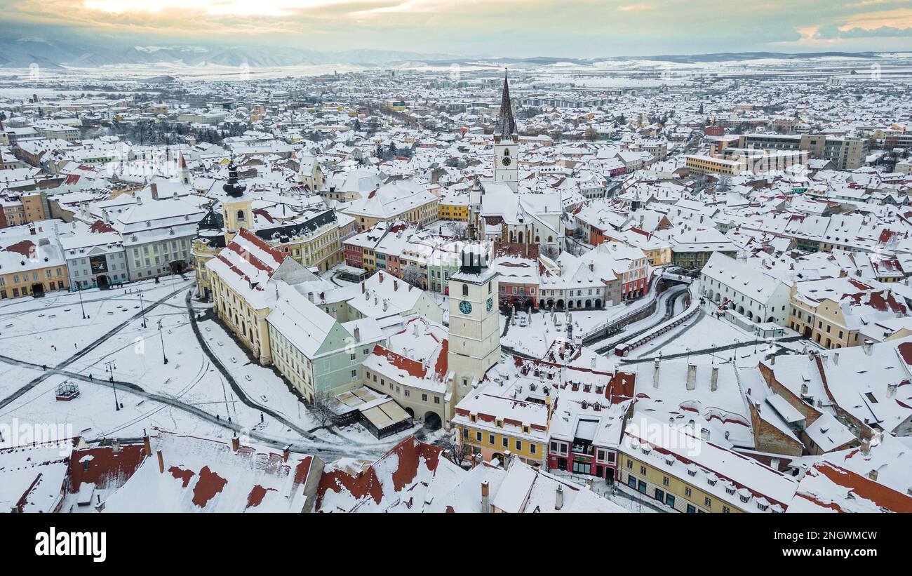 Birds eye view over historic city center of Sibiu, Romania at sunset ...