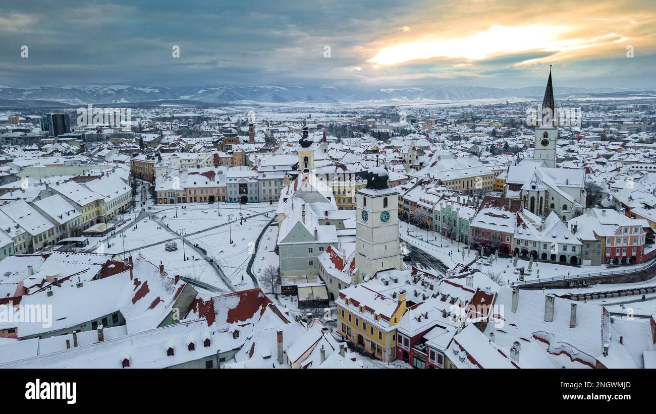 Birds eye view over historic city center of Sibiu, Romania at sunset ...