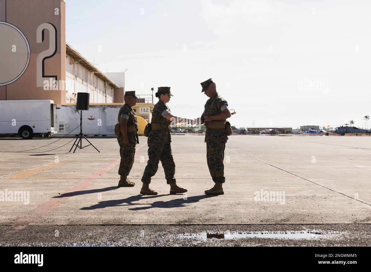 U.S. Marine Corps Lt. Col. Gideon Grissett, center, commanding officer ...