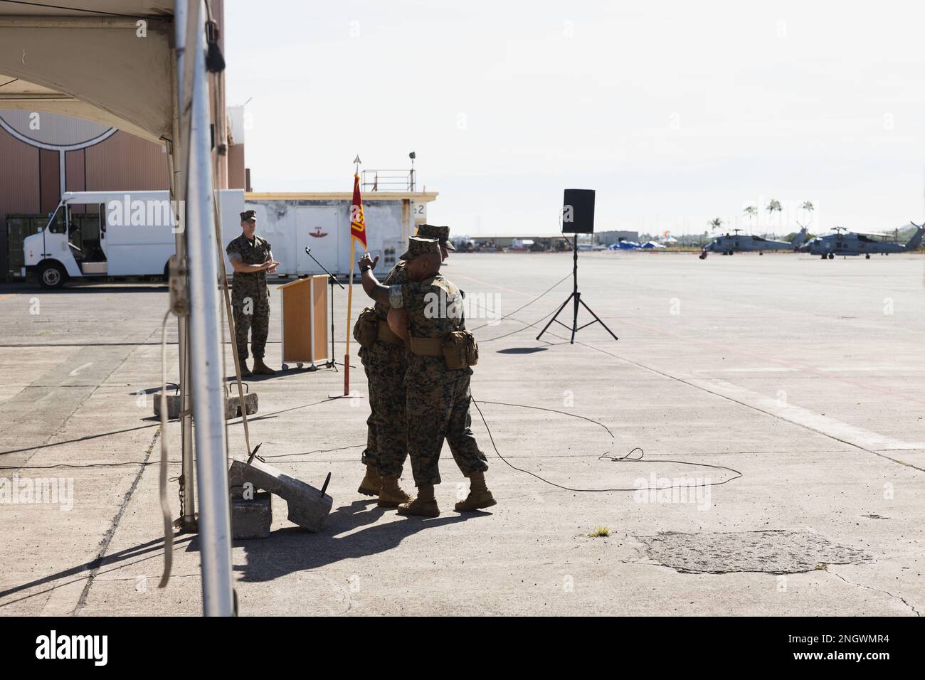 U.S. Marine Corps Sgt. Maj. Kevin Hopkins, left, oncoming sergeant ...
