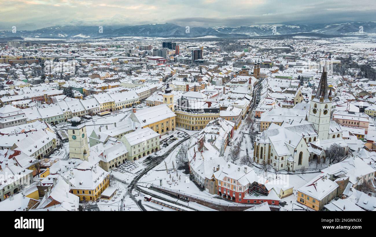 Birds eye view over historic city center of Sibiu, Romania at sunset ...