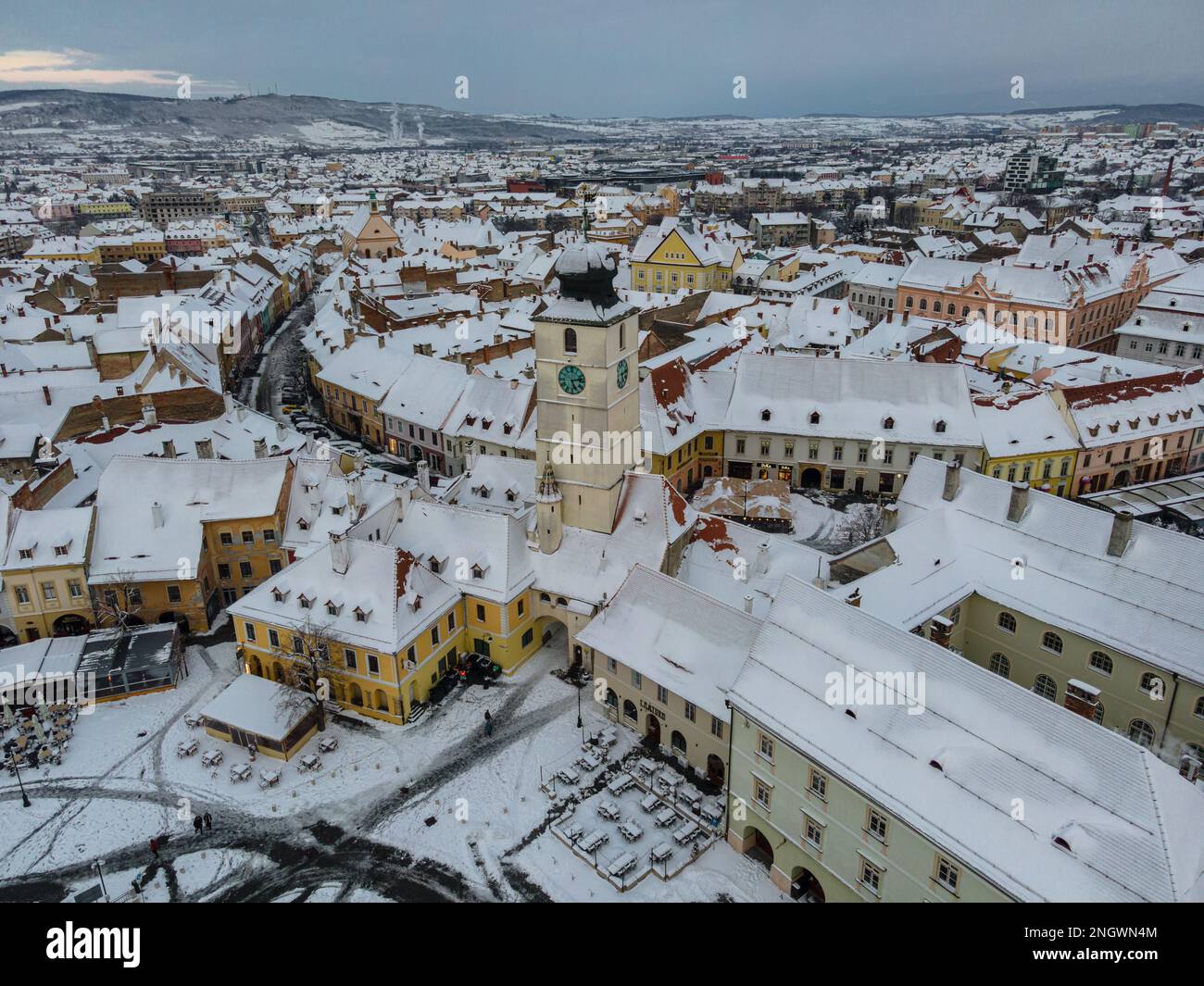 Birds eye view over historic city center of Sibiu, Romania at sunset ...
