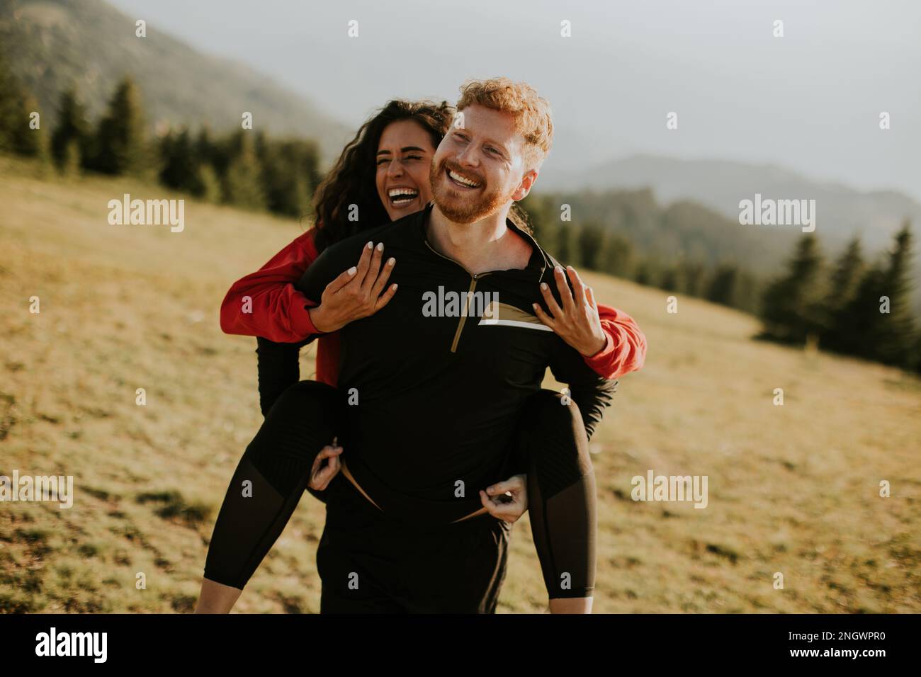 Woman riding piggyback hi-res stock photography and images - Alamy