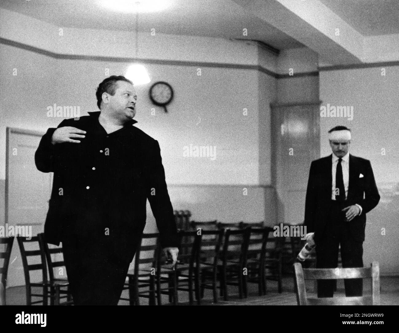 ORSON WELLES directs LAURENCE OLIVIER during rehearsals for RHINOCEROS ...