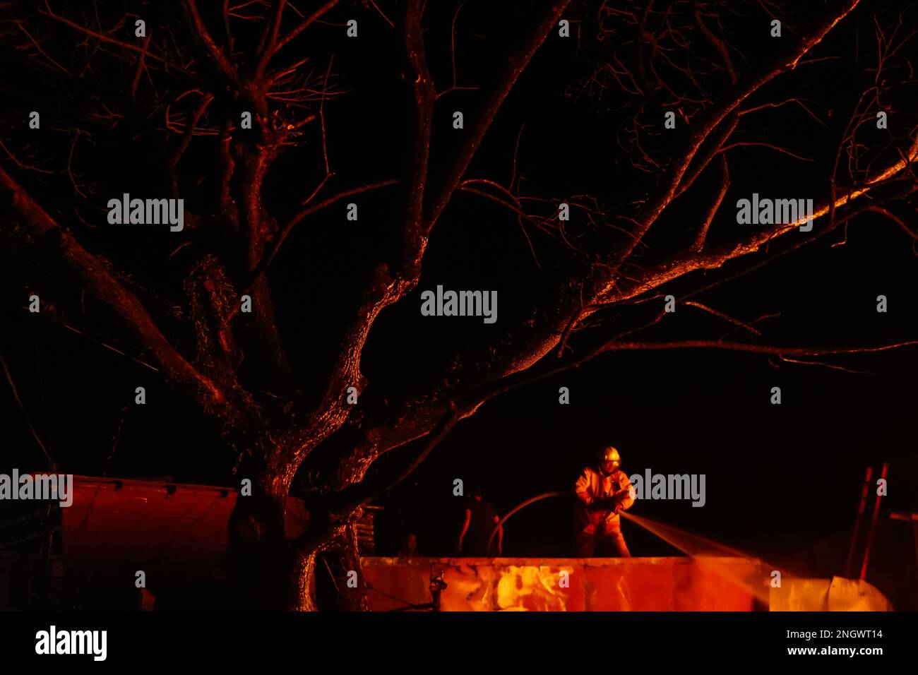 Teresa, Rizal, Philippines. 19th Feb, 2023. A fire volunteer positioned ...