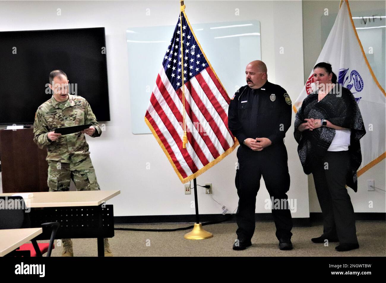 Fort McCoy Garrison Commander Col. Stephen Messenger talks to audience ...