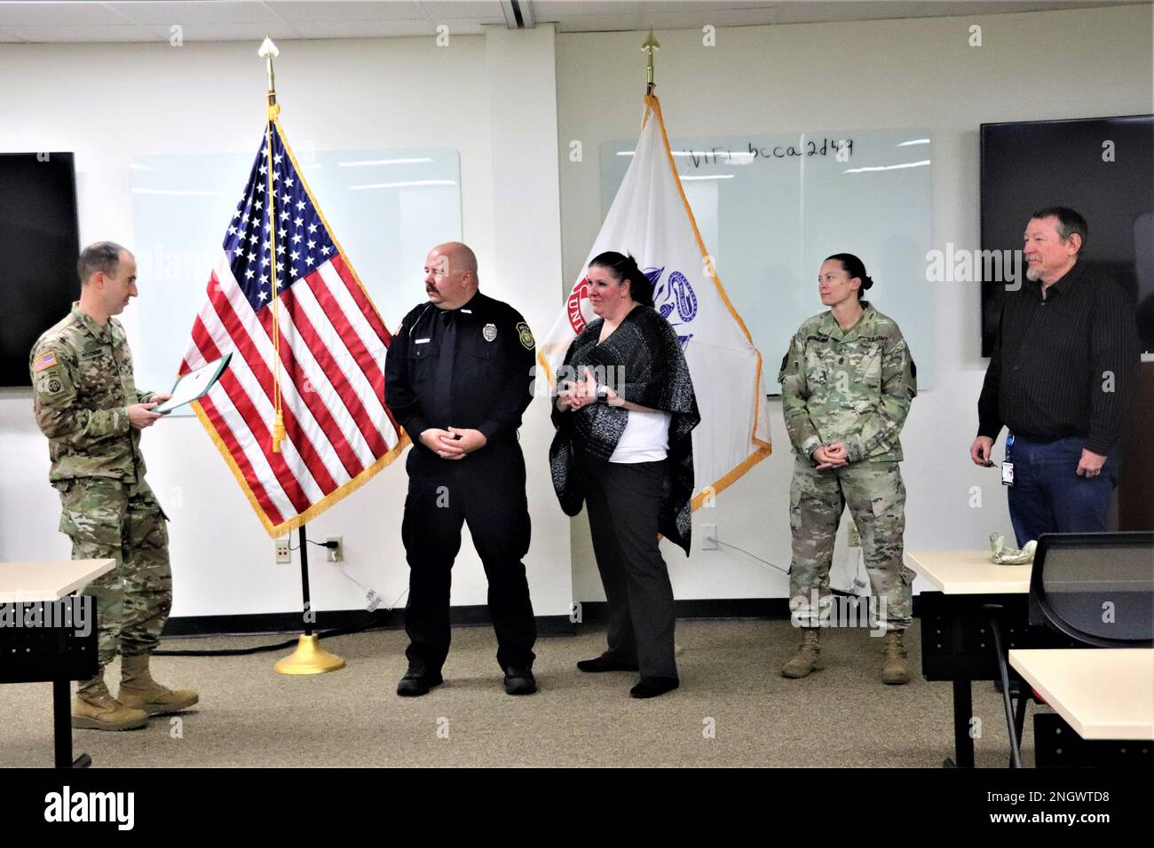 Fort McCoy Garrison Commander Col. Stephen Messenger talks to audience ...