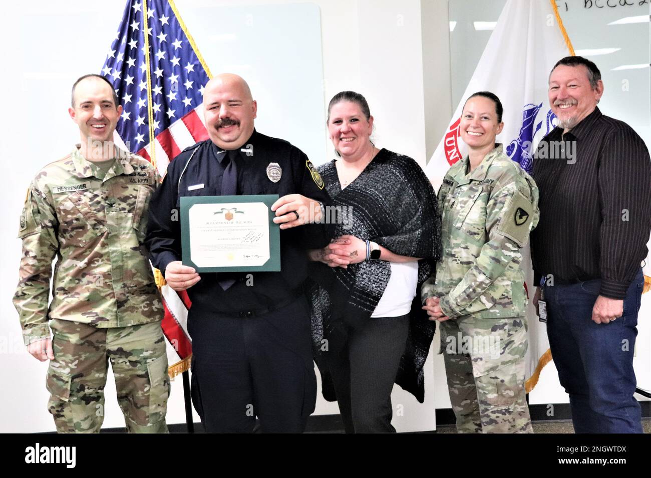 Police Officer Raymond A. Brand II receives the Department of the Army ...
