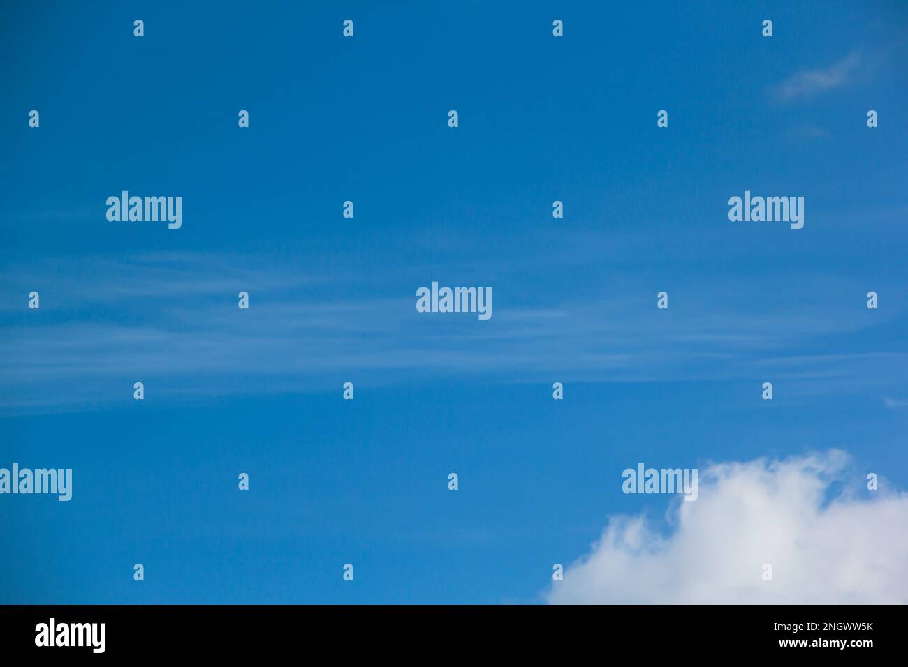 Blue sky with clouds line in a nice weather day Stock Photo - Alamy