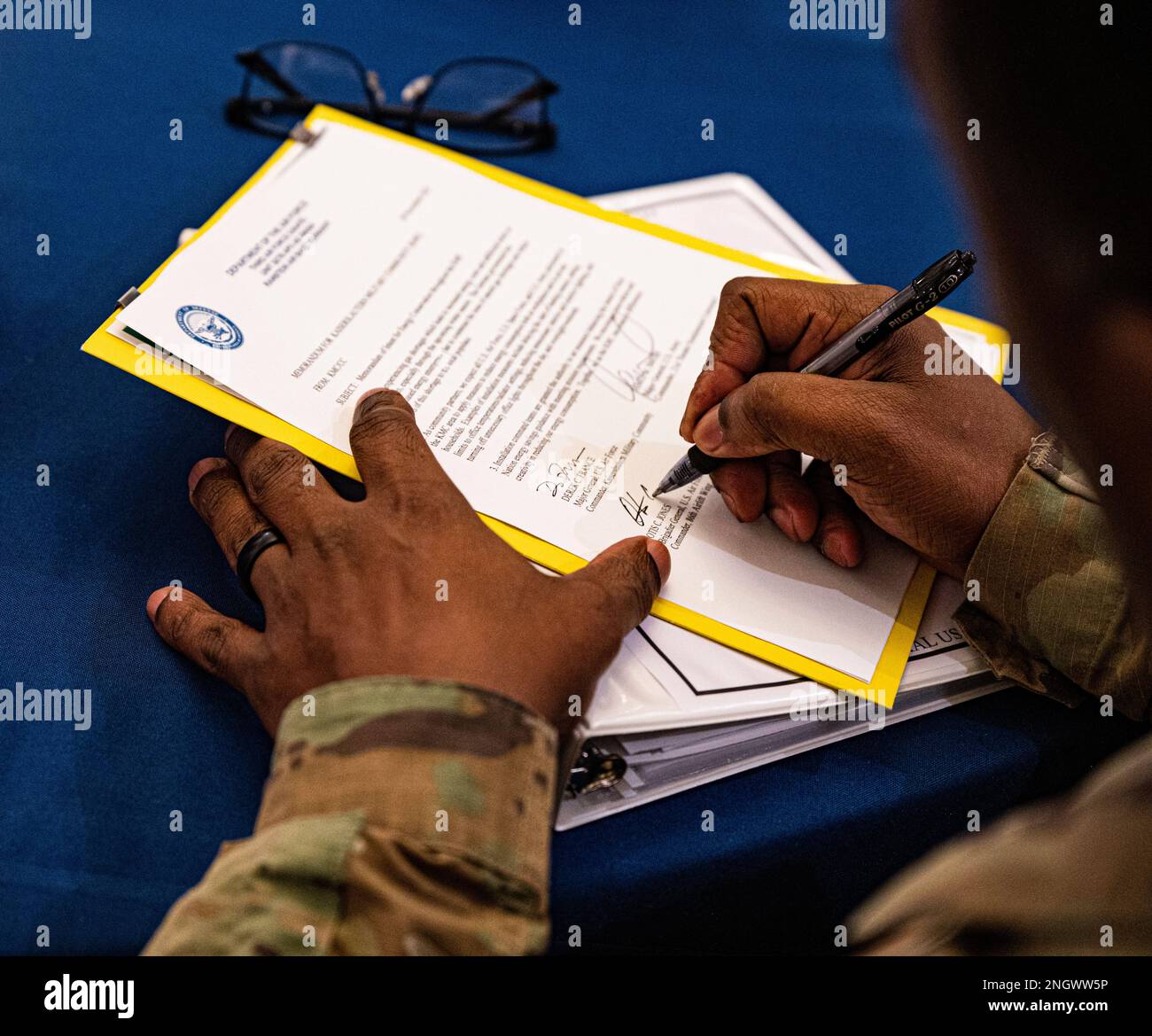 U.S. Air Force Brig. Gen. Otis C. Jones signs an energy conservation ...