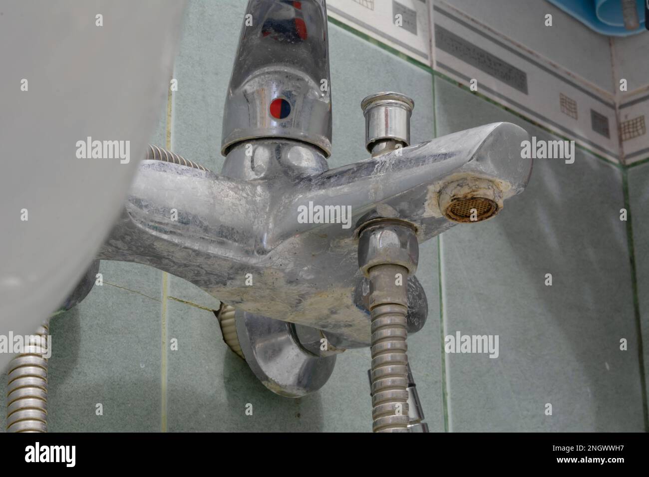 Faucet limescale. Dirty faucet aerator with limescale, calcified shower ...
