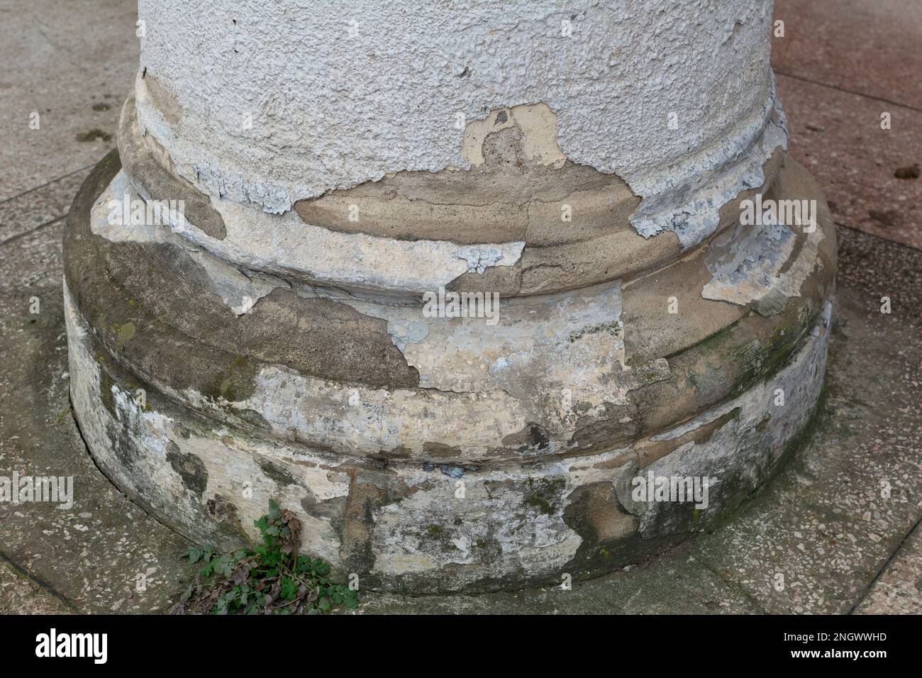 Old column base. Fragment of the base of a cracked column, cracked ...