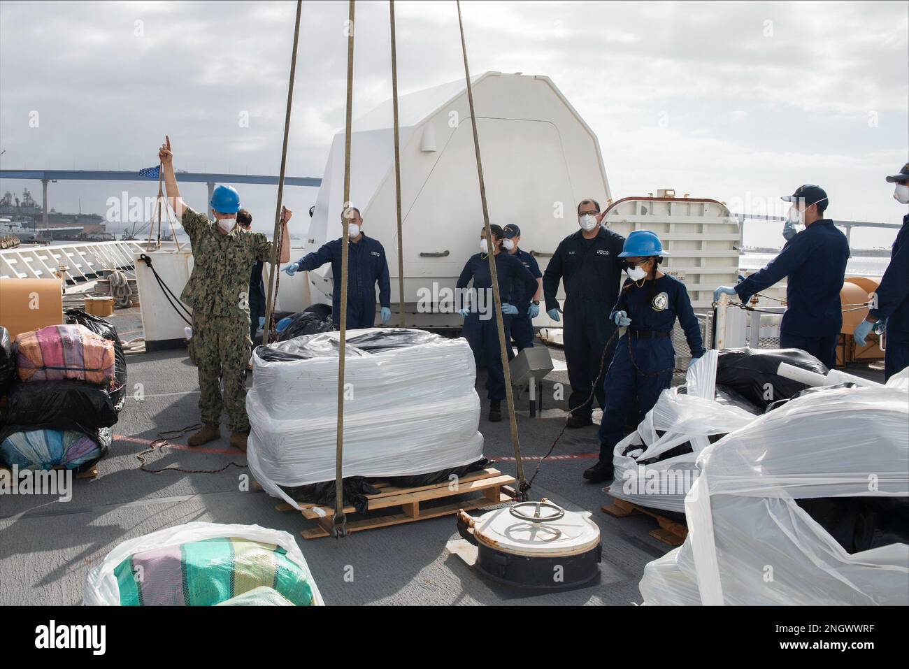 U.S. Coast Guard Cutter Bertholf’s (WMSL 750) crews offload contraband ...