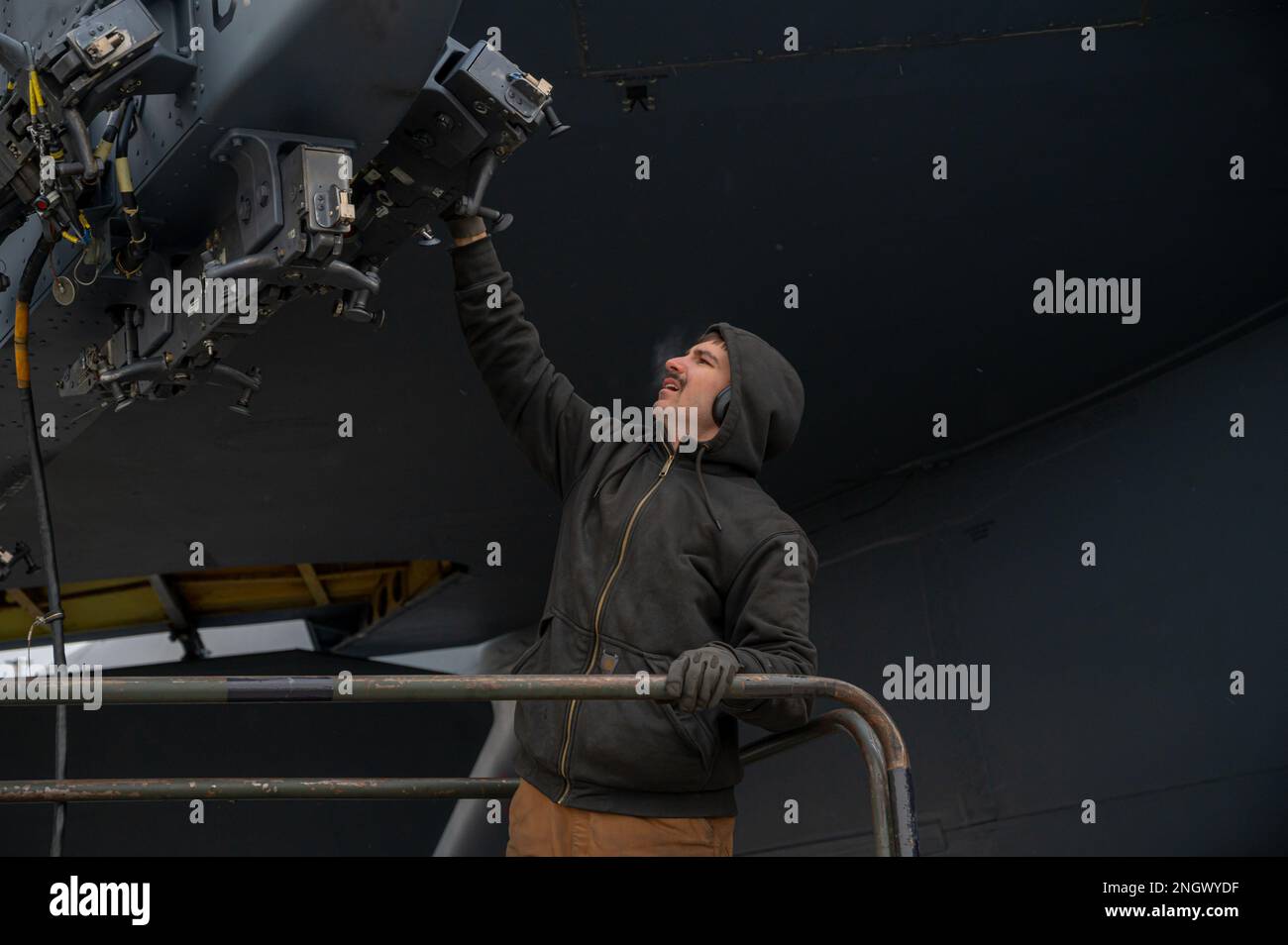 A Crew chief with the 5th Bomb Wing prepares a b-52H Stratofortress ...