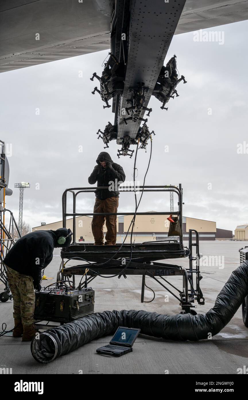 Crew chiefs with the 5th Bomb Wing prepare a b-52H Stratofortress pylon ...