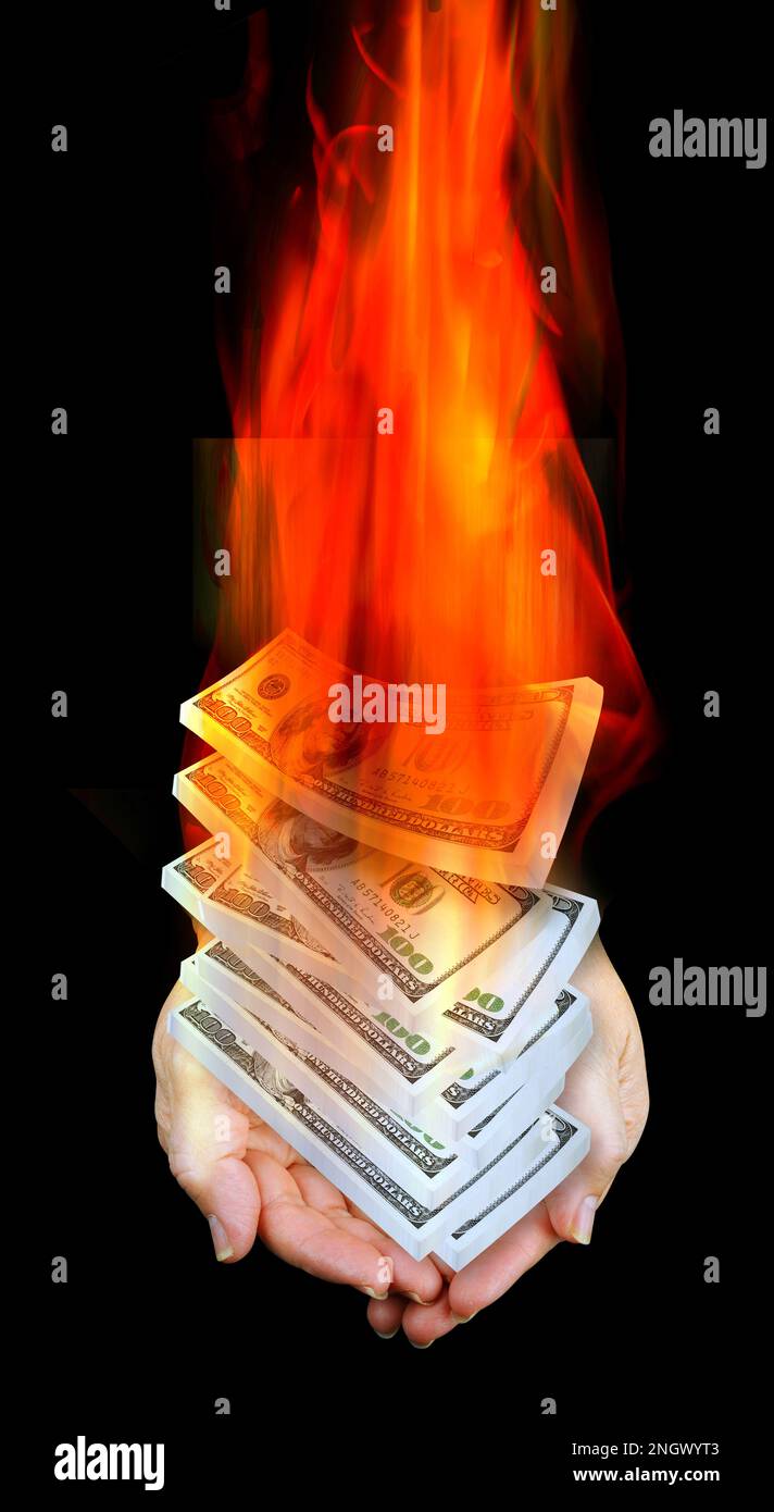 Money on fire and burning away with inflation Stock Photo - Alamy