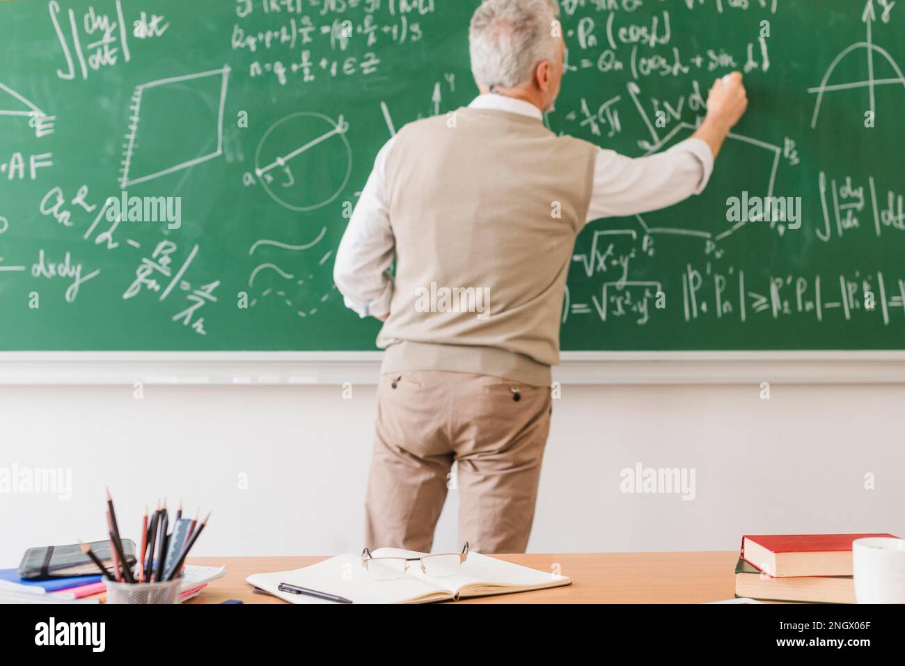 Maths teacher hi-res stock photography and images - Alamy