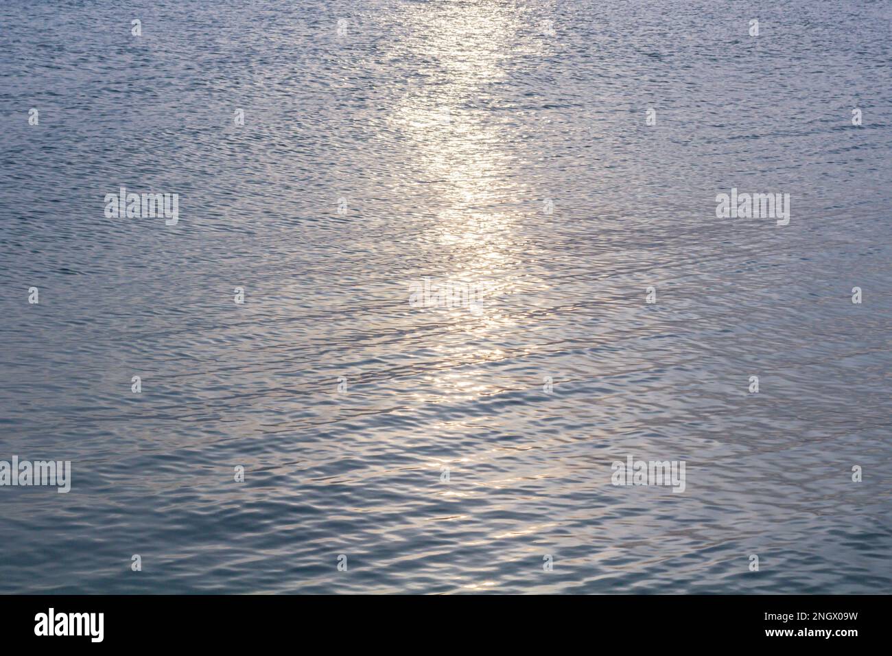 Detail of a sunlight reflecting in glittering sea. sparkler in water ...