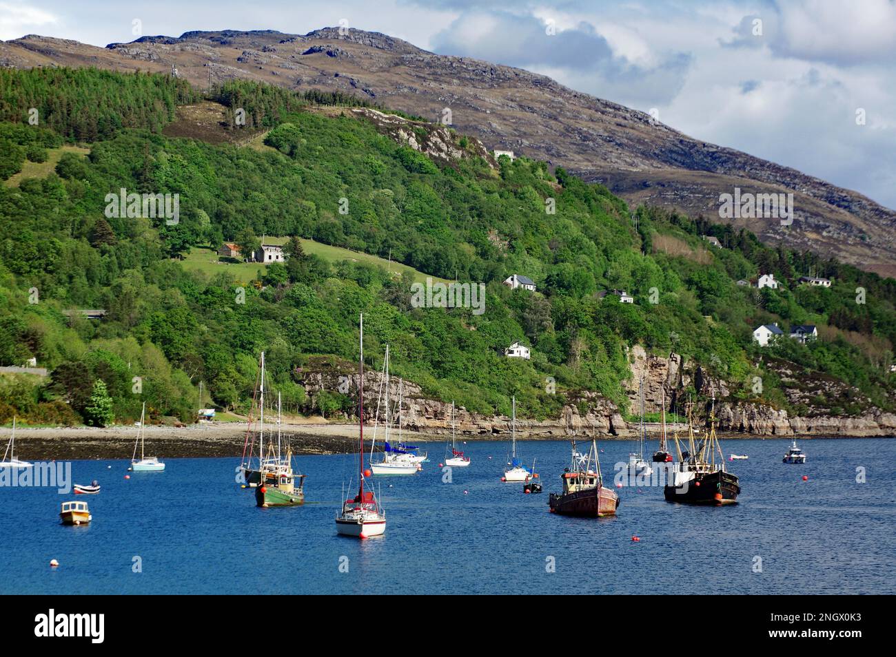 Small harbour with many fishing and leisure boats, Ullapool, Highlands ...