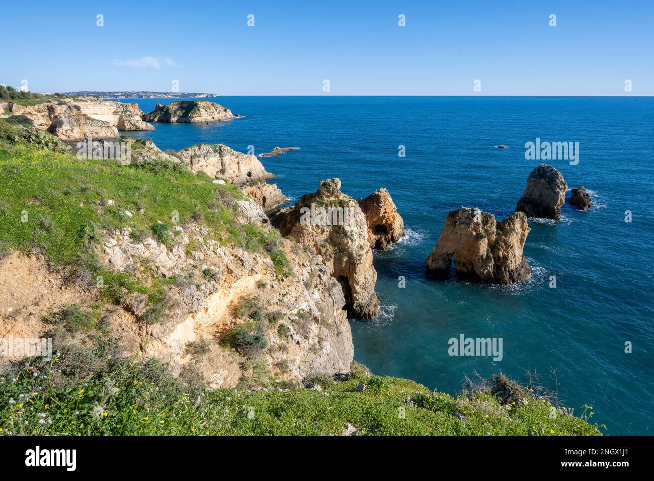 Praia Joao de Arens, rocks and cliffs, steep coast in the Algarve ...