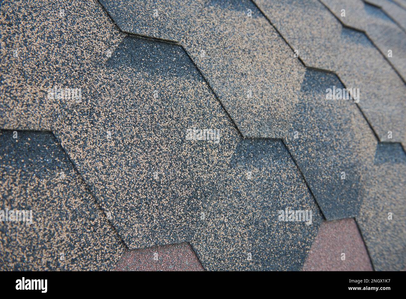 Roof of the house made of flexible bitumen tiles Stock Photo - Alamy