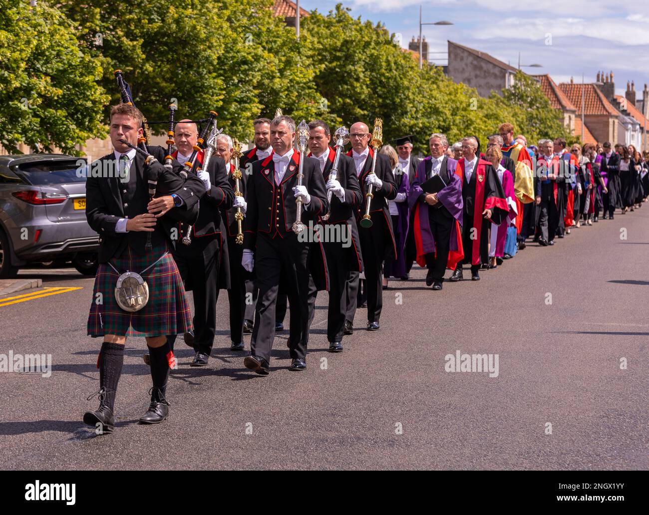 ST ANDREWS, FIFE, SCOTLAND, EUROPE - Bag Piper and mace bearers, during ...
