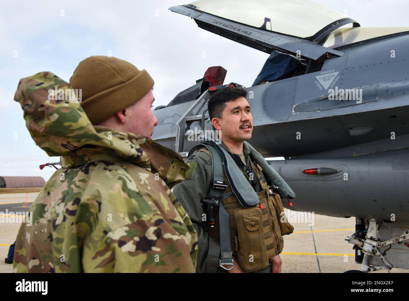 U.S. Air Force Capt. Matthew Hale, 35th Fighter Squadron pilot (right ...