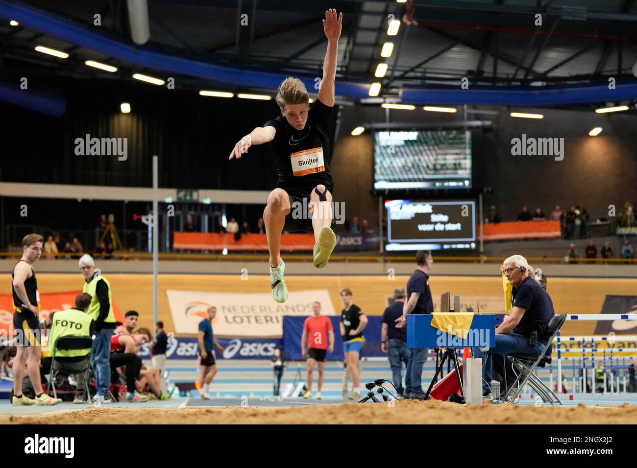 Justin sluijter competing on the long jump men hi-res stock photography ...