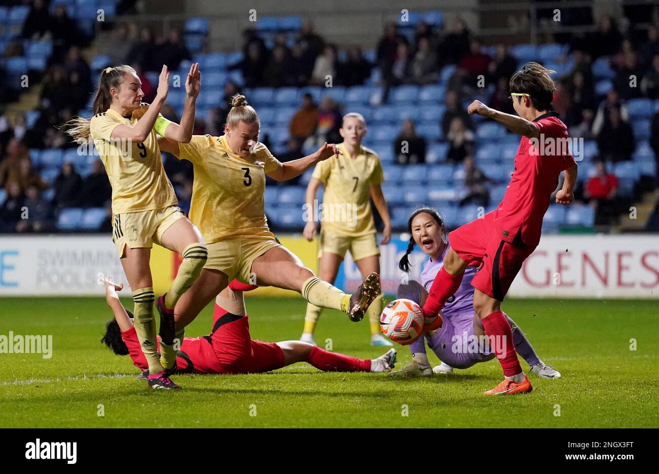 Korea Republic's Lim Seon-Joo (right) clears the ball away from the ...