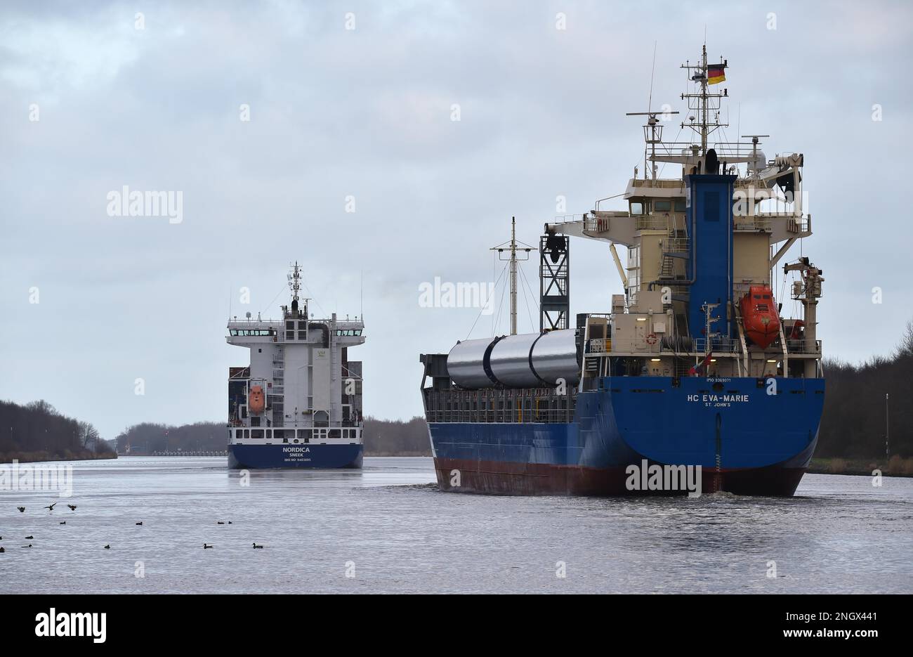 Cargo ship and container ship sailing through the Kiel Canal, Schleswig ...