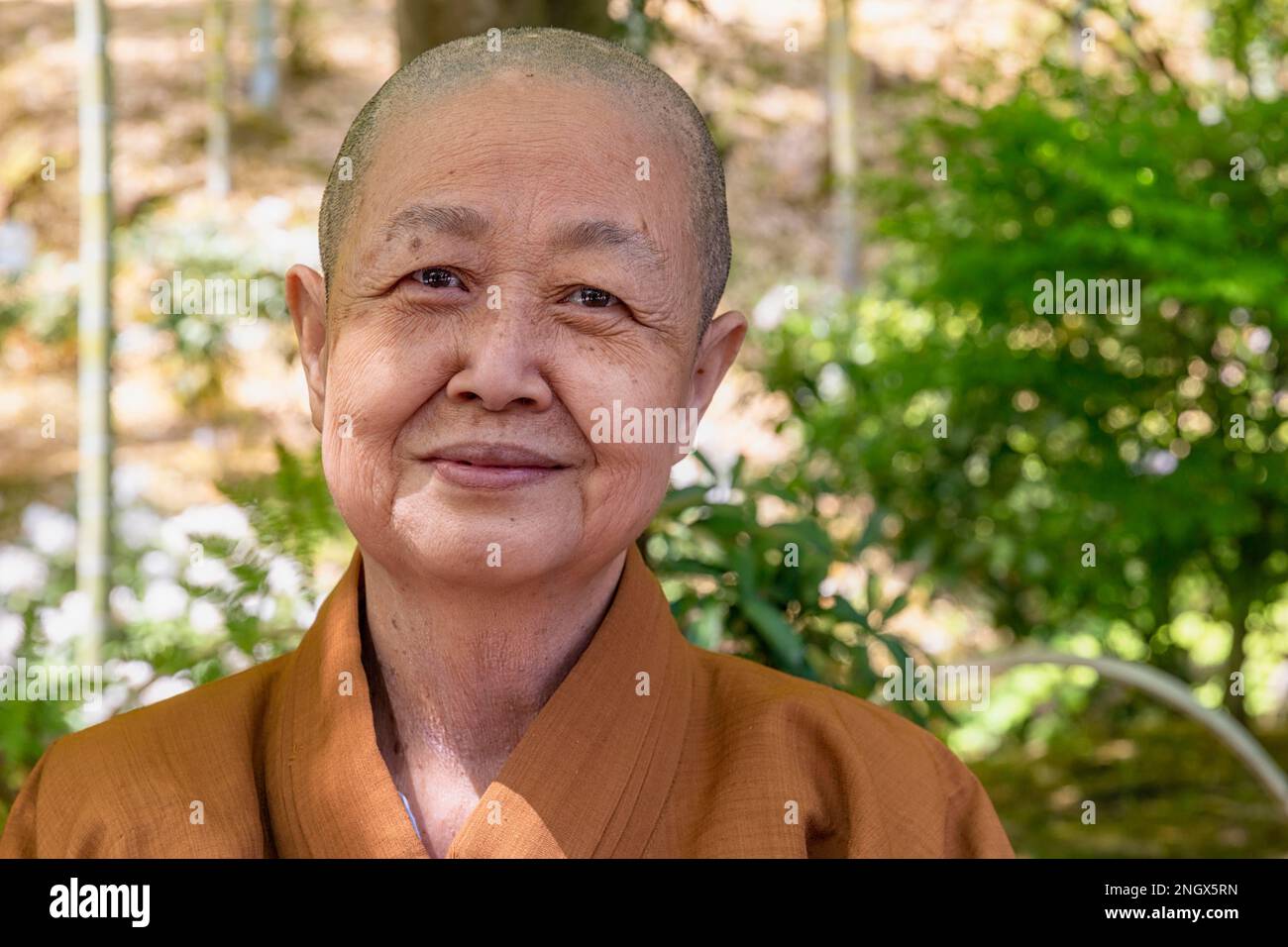 Kyoto Japan. Portrait of a senior nun Stock Photo - Alamy