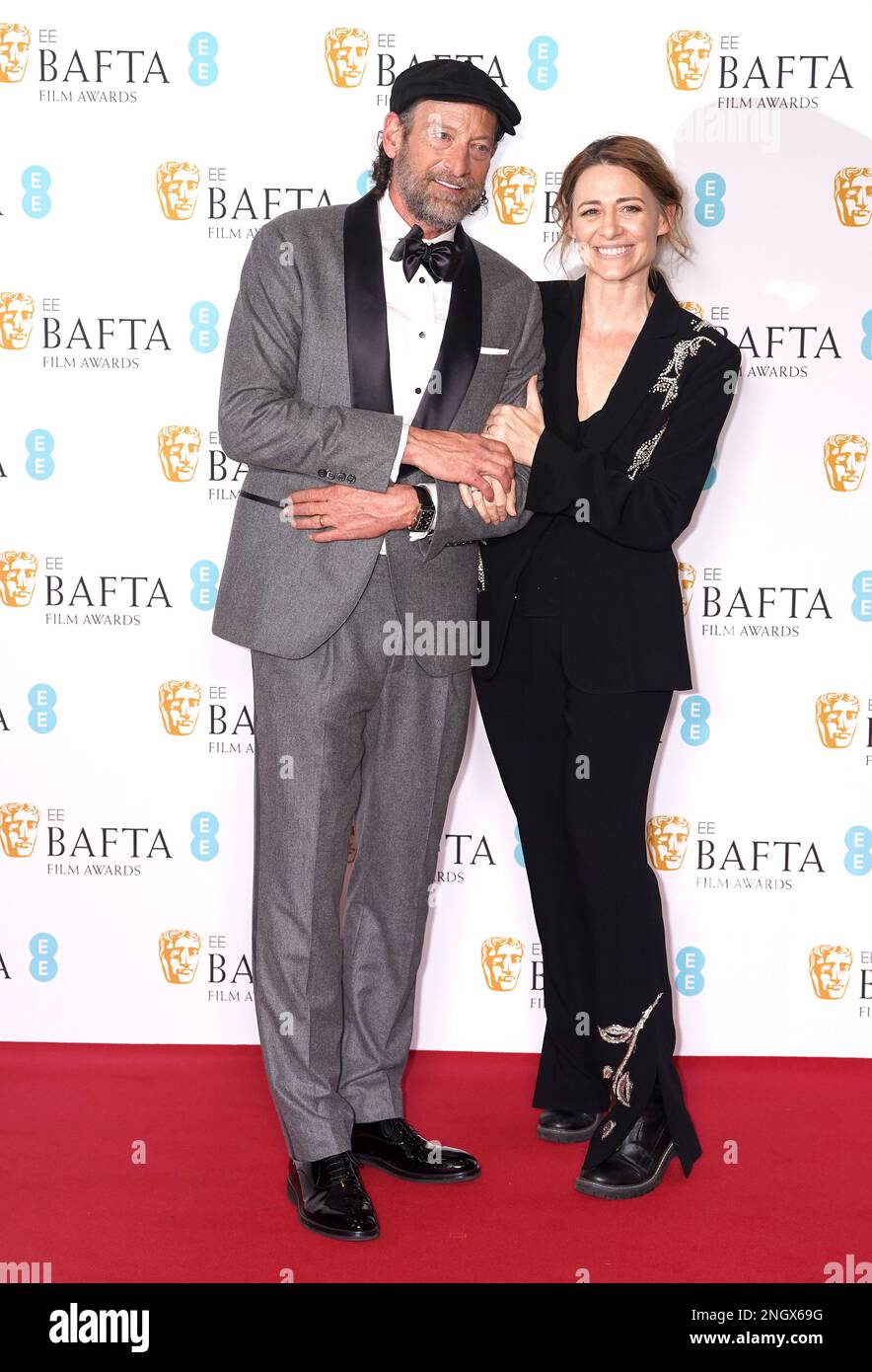Troy Kotsur (left) and wife Deanne Bray in the press room at the 76th ...