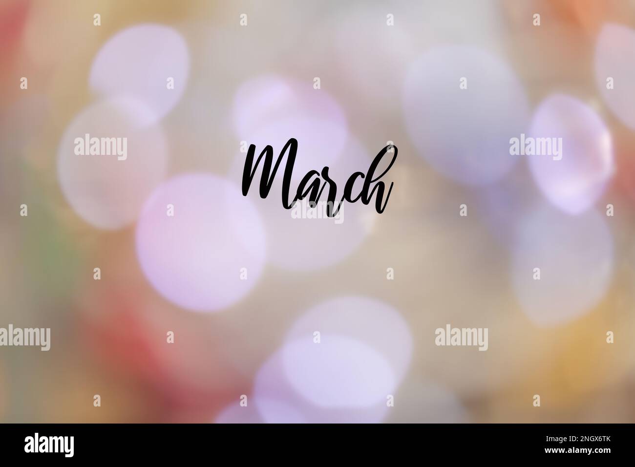 A blurred colorful background with the name "March" in English written ...