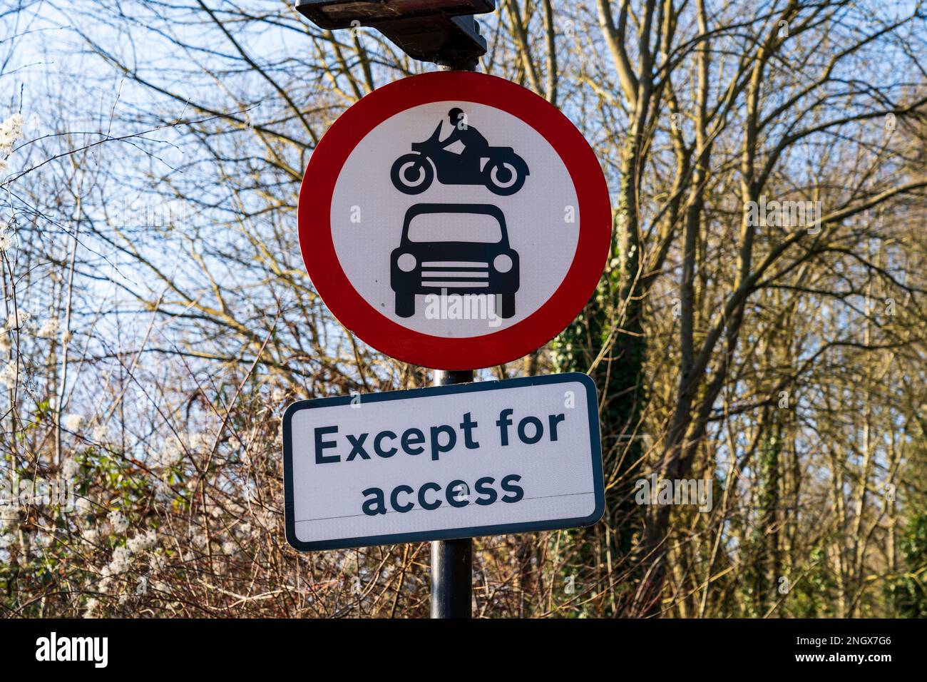 UK Traffic sign stating no motor vehicles on a red and white warning ...