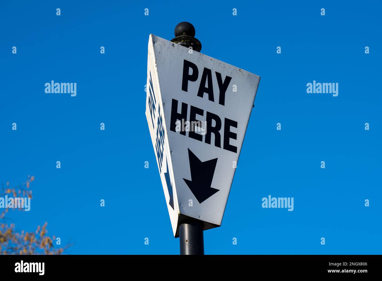 Pay here sign at.a parking site in Ironbridge in Shropshire, UK on a ...