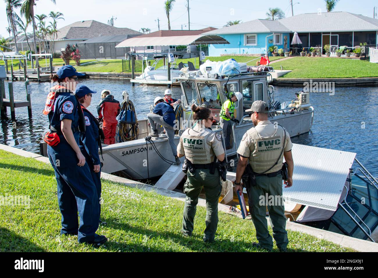 Coast Guard Lt. Cmdr. Lucy Courtney and Cmdr. Johna Rossetti observe ...
