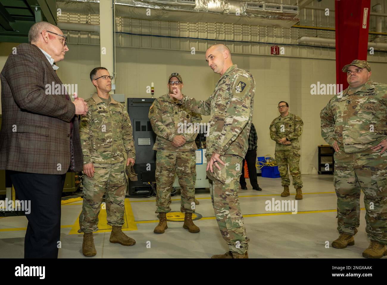 U.S. Army Col. Jacob Miller, 128th Aviation Brigade commander, briefs ...